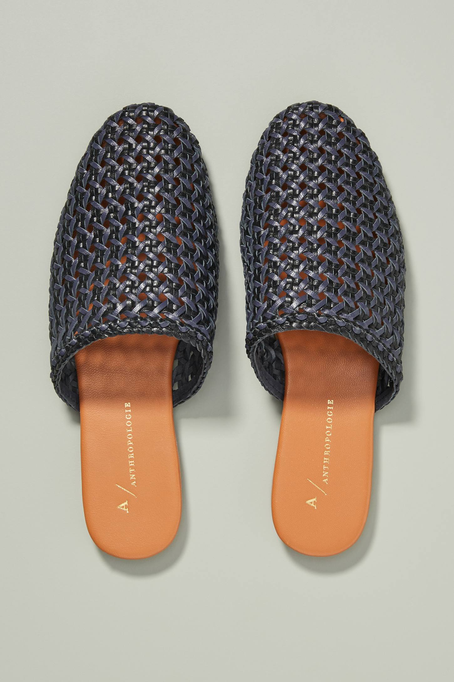 black-leather-woven-slides